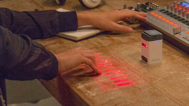 The World’s Most Advanced Projection Keyboard Plays Music Too