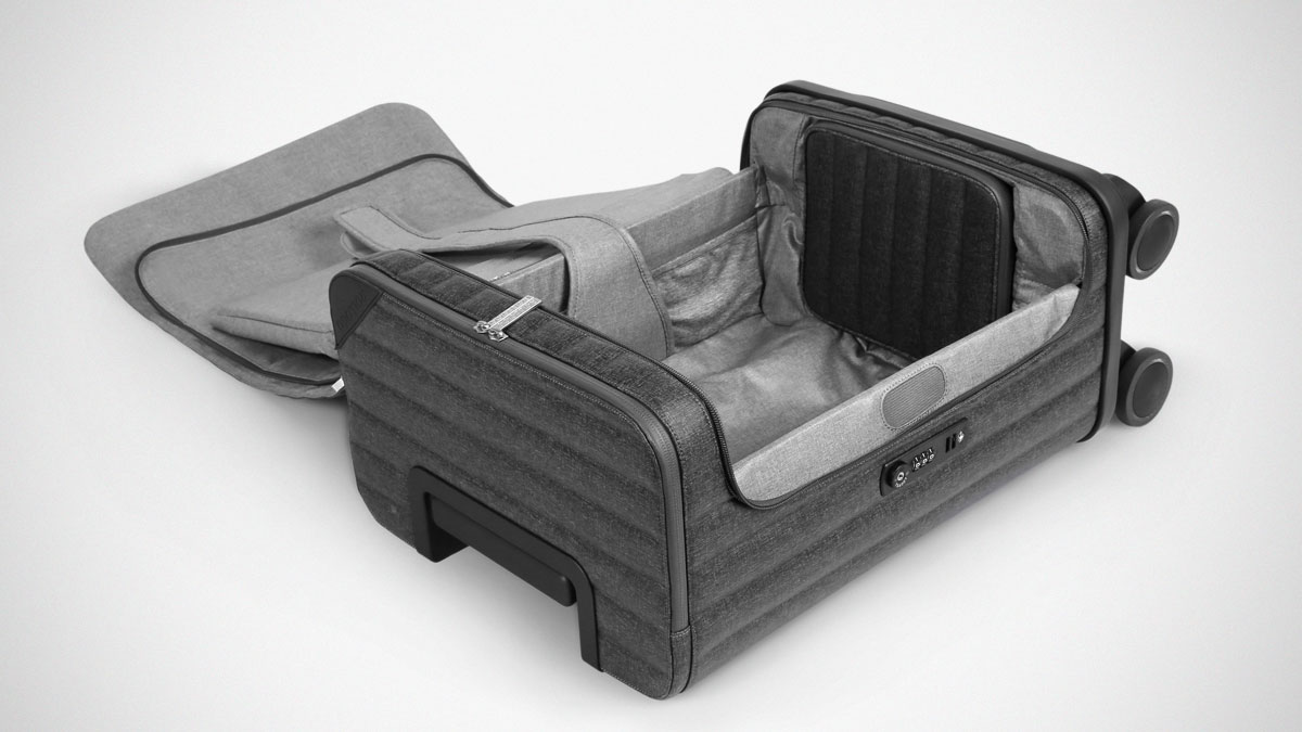 Rolling Along This Carry-on Will Keep Its Onboard, Removable Power Bank ...