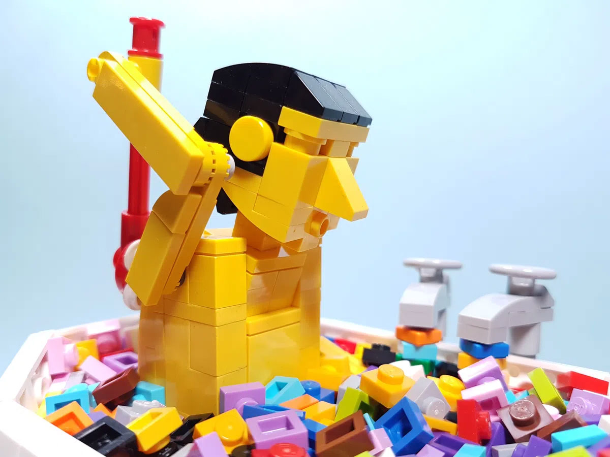 LEGO Kinetic Art Of A Person Bathing In LEGO Bricks Is Awesome And Fun