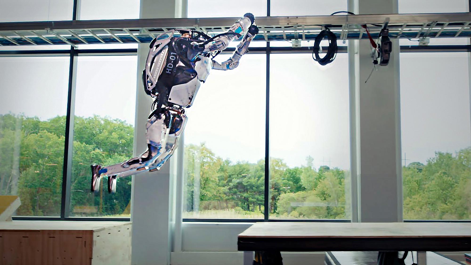 Watch Two Boston Dynamics Atlas Robots Clear An Entire Parkour Obstacle Watch Two Boston Dynamics Atlas Robots Clear An Entire Parkour Obstacle
