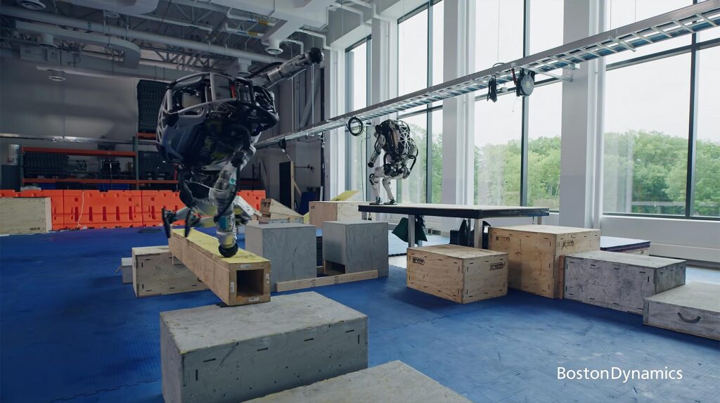 Watch Two Boston Dynamics Atlas Robots Clear An Entire Parkour Obstacle ...