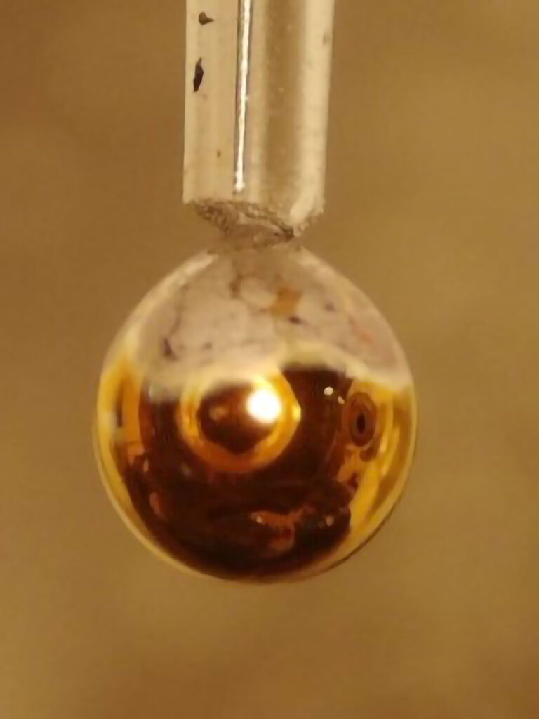 Scientists Turned Water Into Metal With A Golden Glow