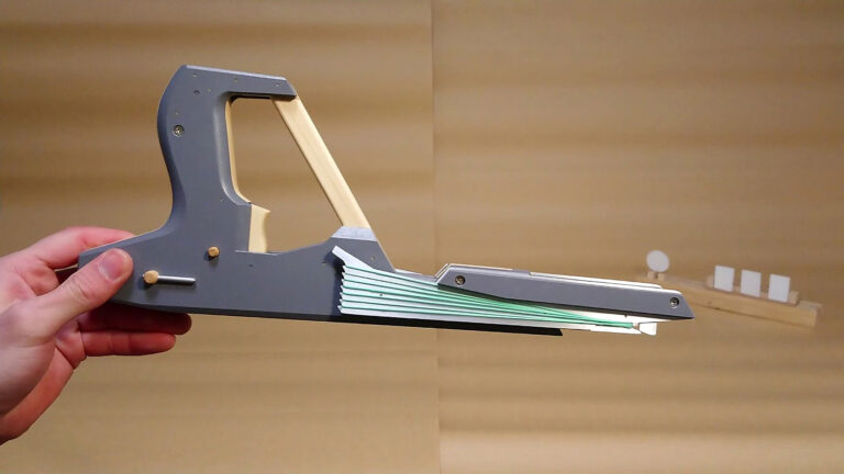 This Semi-automatic Rubber Band Gun Has “Magazines” That Magnetically ...