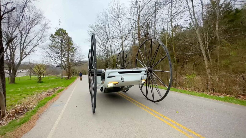 Tesla On Giant Bullock Cart-Like Giant Wheels (Tesla Lovers May Want To ...