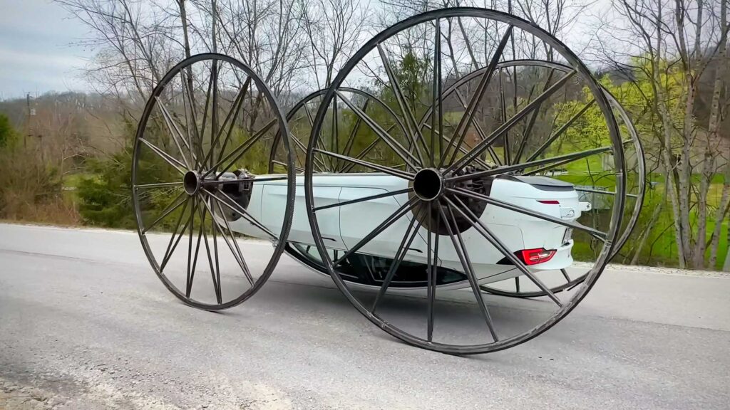 Tesla On Giant Bullock Cart-Like Giant Wheels (Tesla Lovers May Want To ...