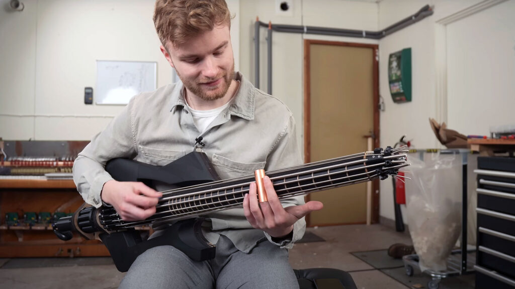 Someone Made An Electric Guitar With A Cylindrical Neck That Has A ...