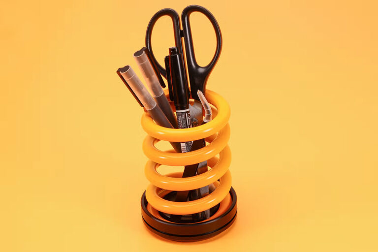 This Shock Absorber Pen Holder Has No Business Looking This Good