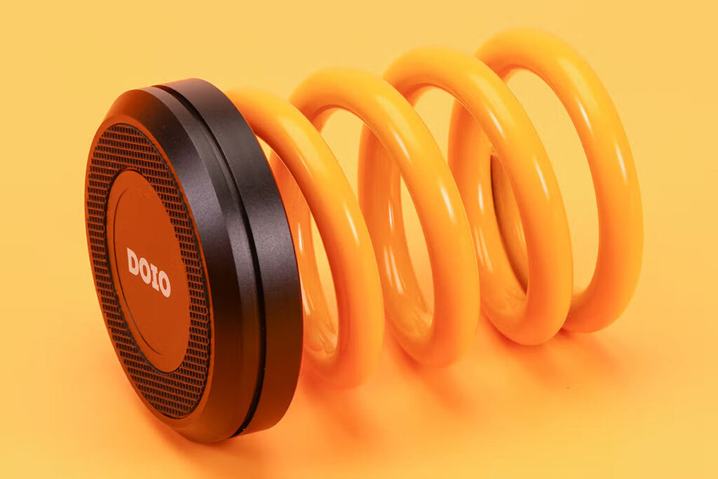 This Shock Absorber Pen Holder Has No Business Looking This Good